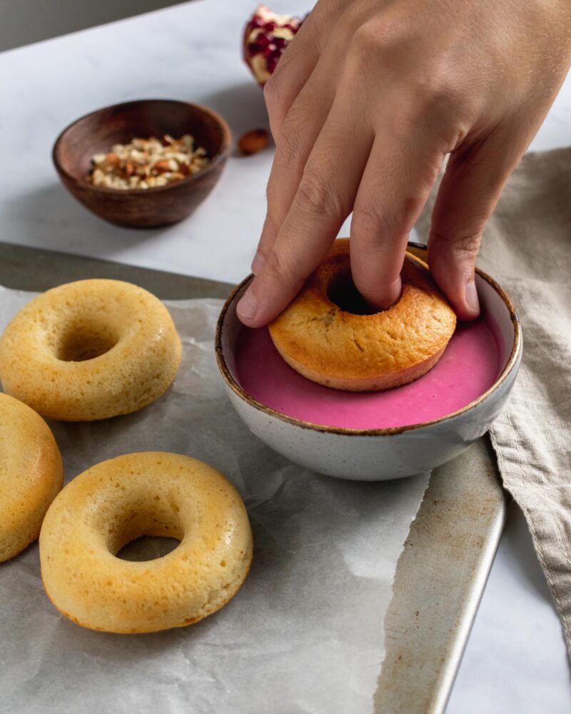 Almond baked doughnuts with a pomegranate glaze | Apron & Whisk