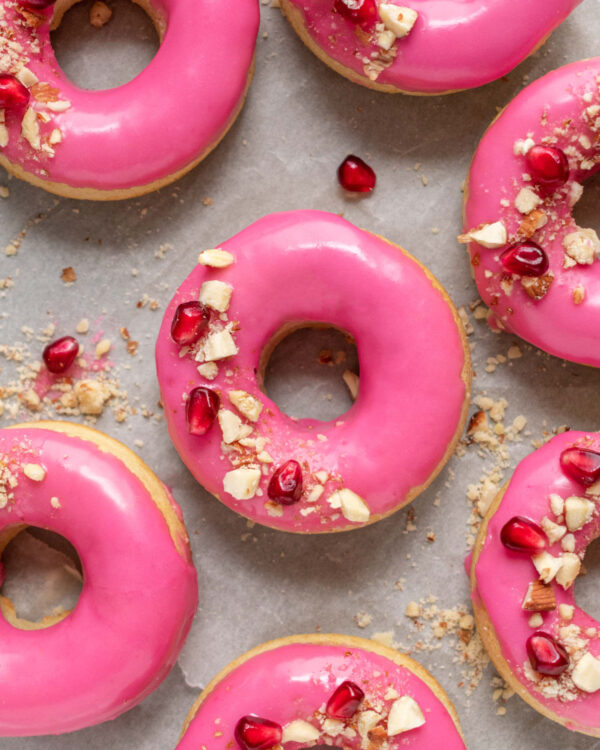 Almond baked doughnuts with a pomegranate glaze | Apron & Whisk