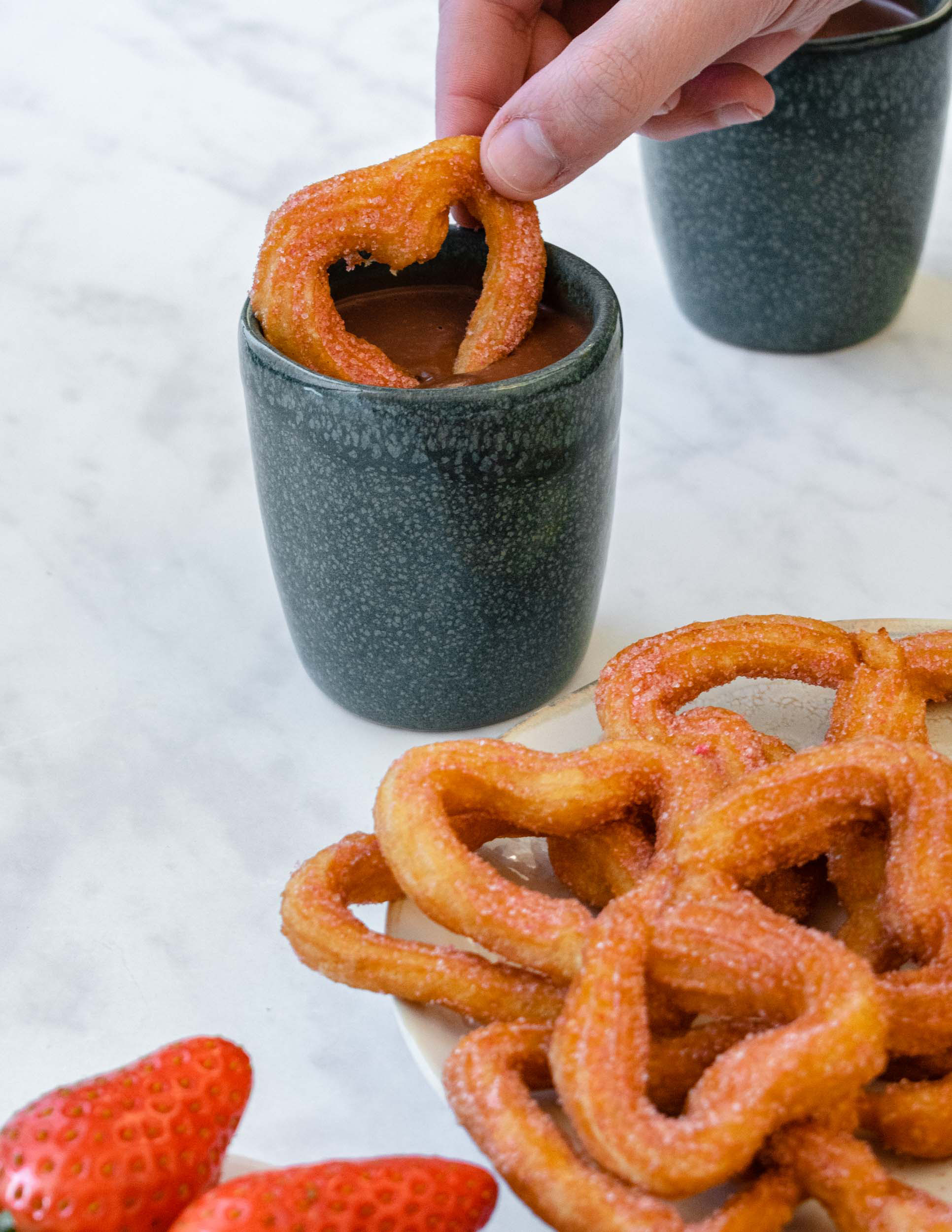 Heart-Shaped Churros with a thick chocolate sauce - Apron & Whisk