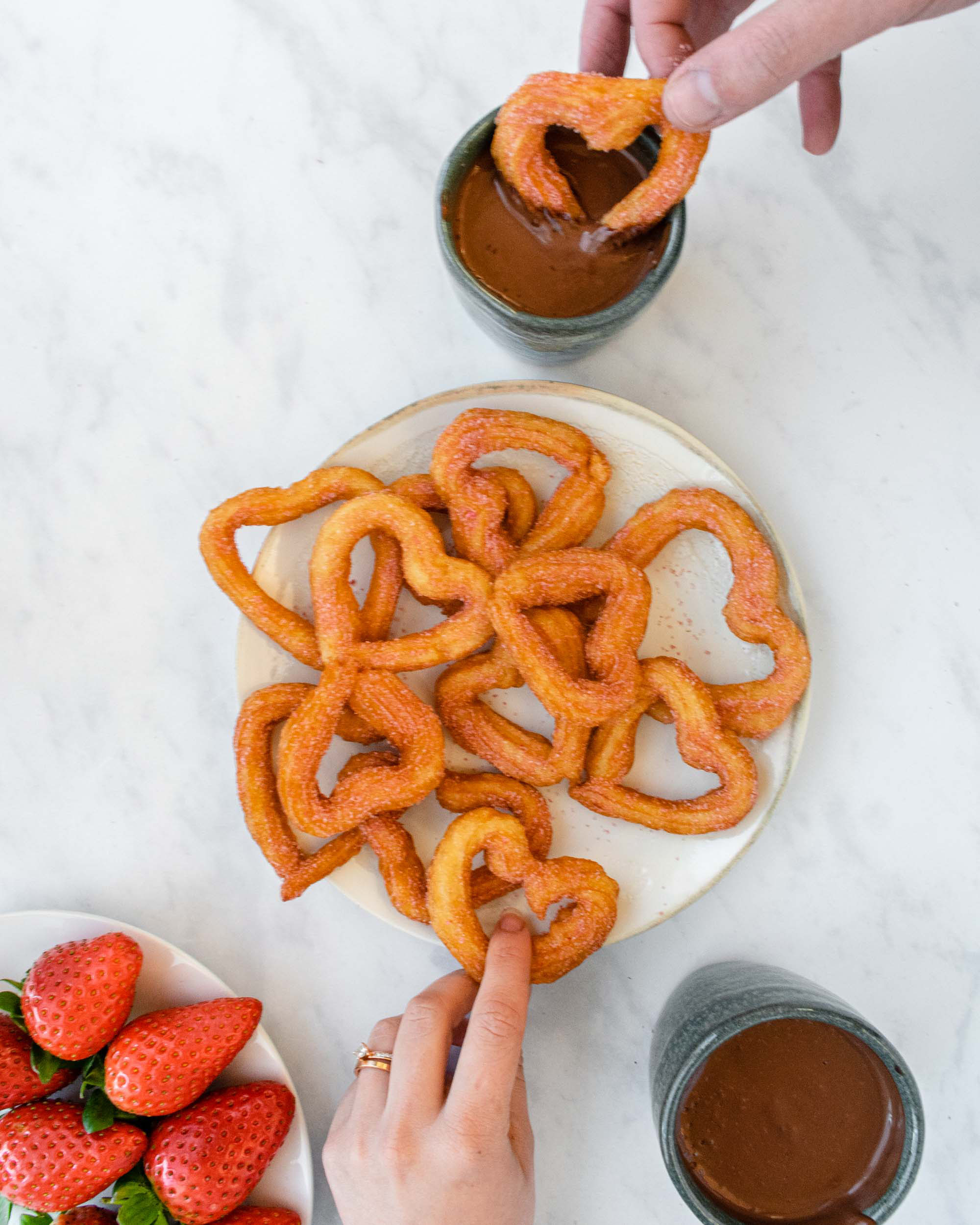 Heart-Shaped Churros with a thick chocolate sauce - Apron & Whisk