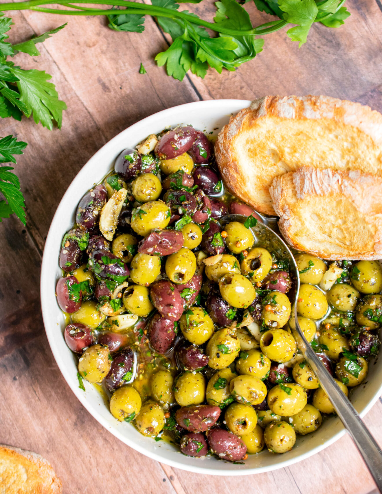 Herbed Marinated Olives with Honey and Garlic - Apron & Whisk